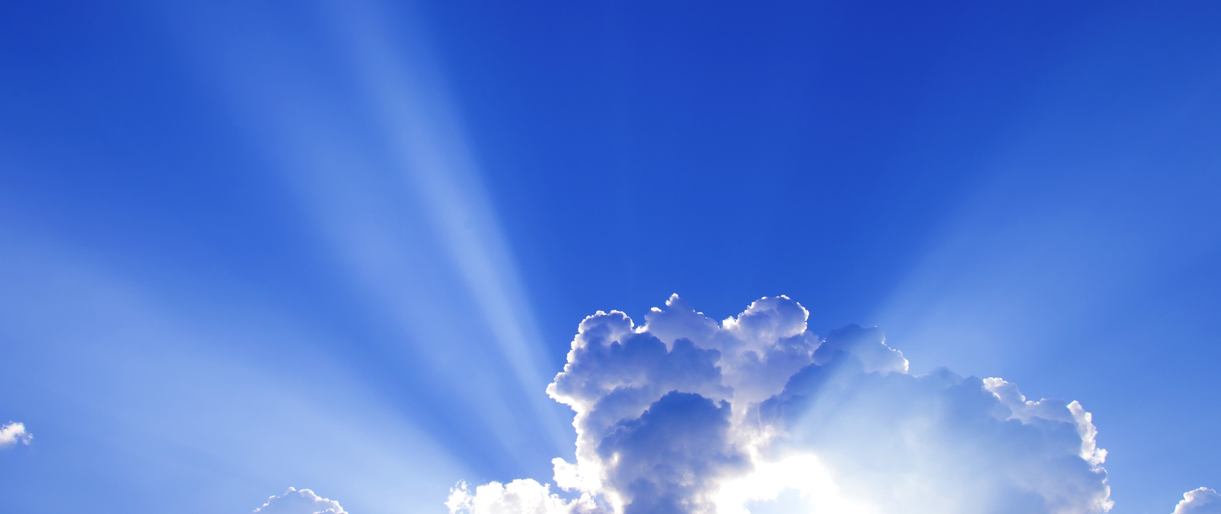 sun rays with clouds on blue sky landscape. – gracewatch